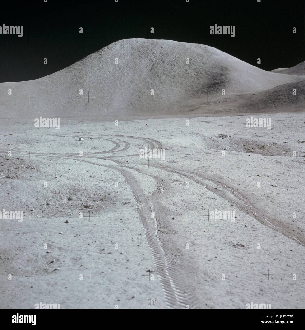 The Moon - (FILE) -- The moon's Mount Hadley rises about 4,765 feet ...
