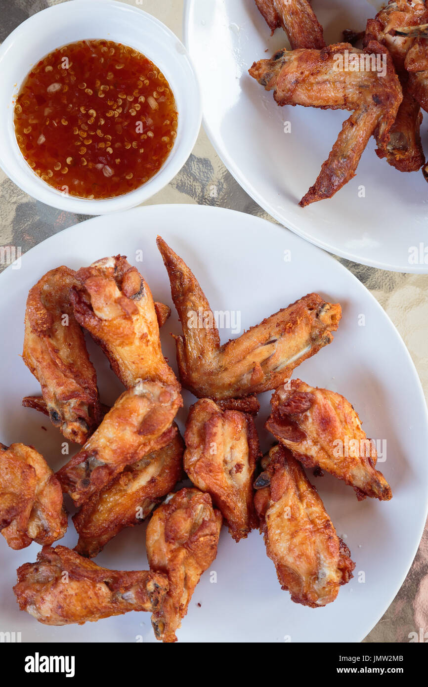 Deep fried wings of chicken Stock Photo - Alamy