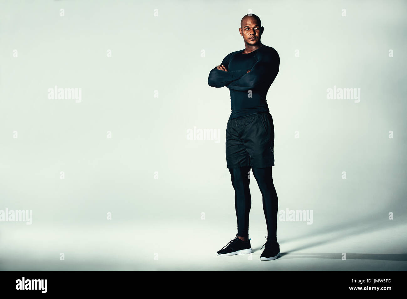 Bodybuilder crossed arms hi-res stock photography and images - Alamy