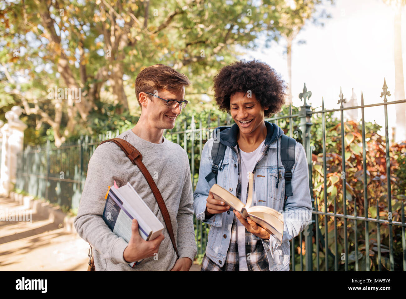 Looking at book hi-res stock photography and images - Alamy