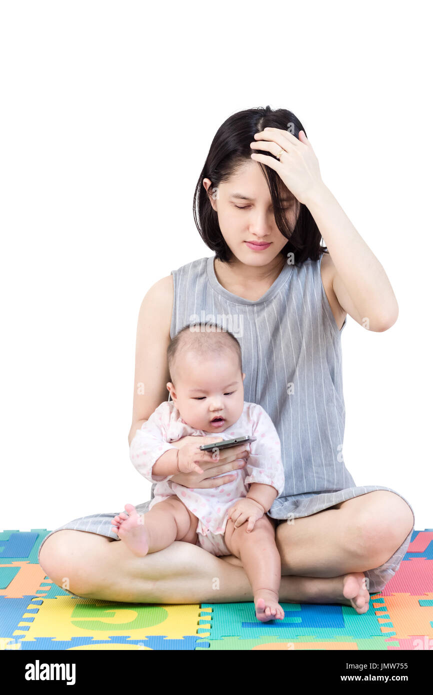 Portrait of a little adorable infant baby girl sitting on mother lap on ...