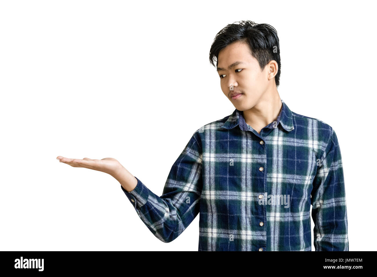 Young man pointing aside Cut Out Stock Images & Pictures - Alamy