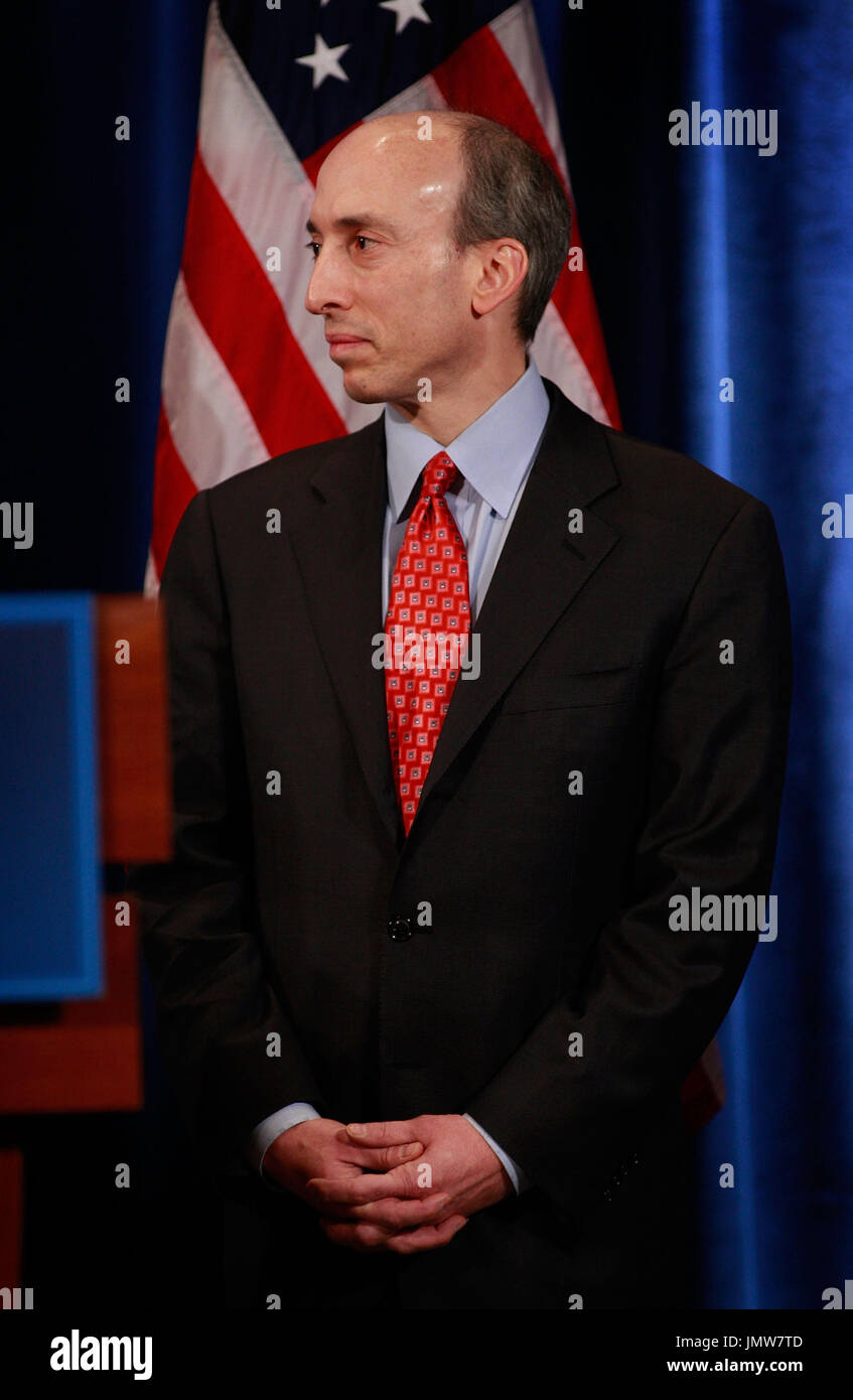Chicago, IL - December 18, 2008 -- Gary Gensler listens as he is ...