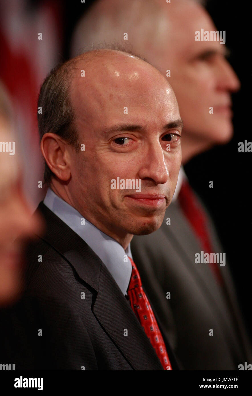 Chicago, IL - December 18, 2008 -- Gary Gensler listens as he is ...