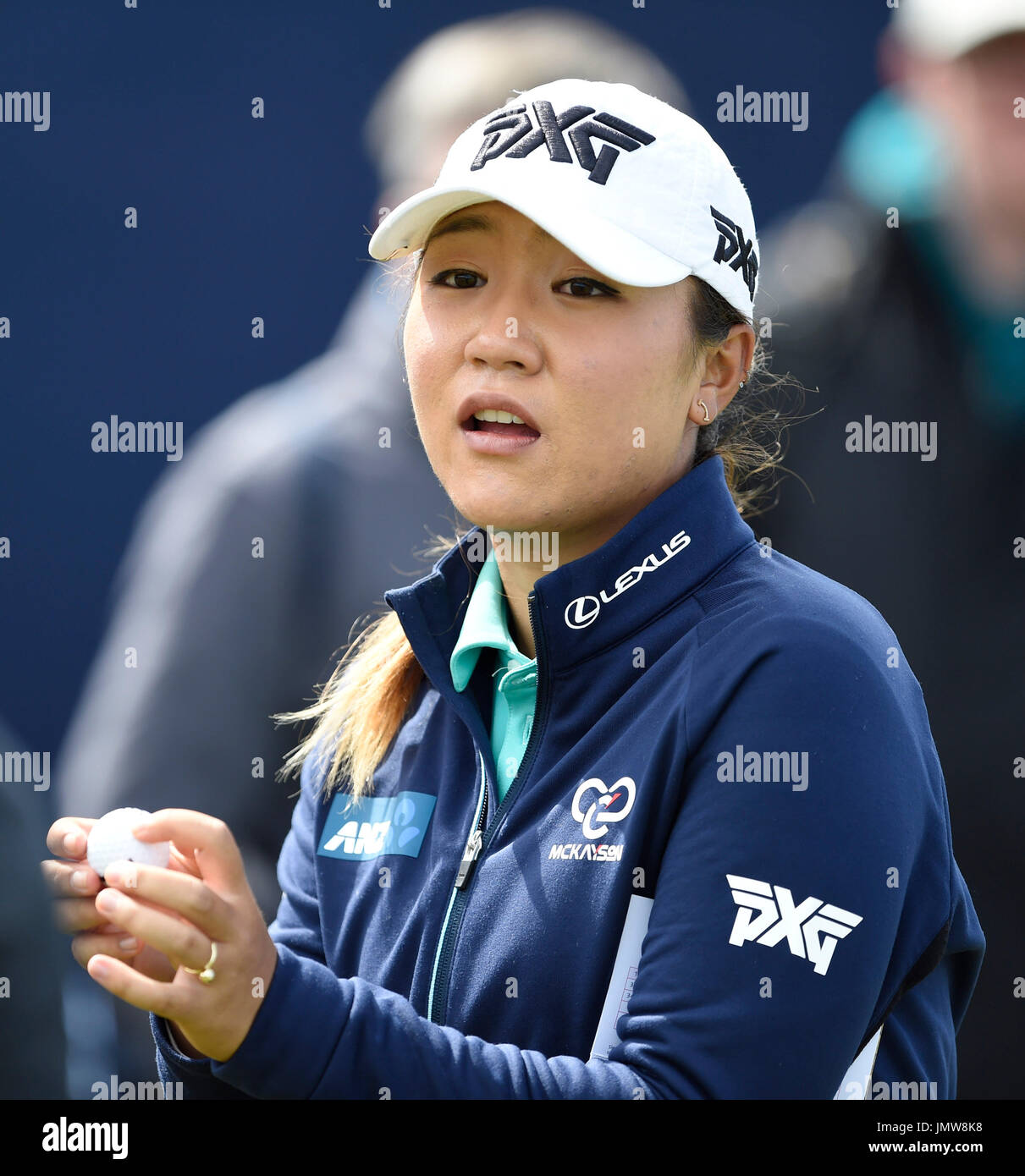 New Zealand's Lydia Ko signs her ball after finishing her round during ...