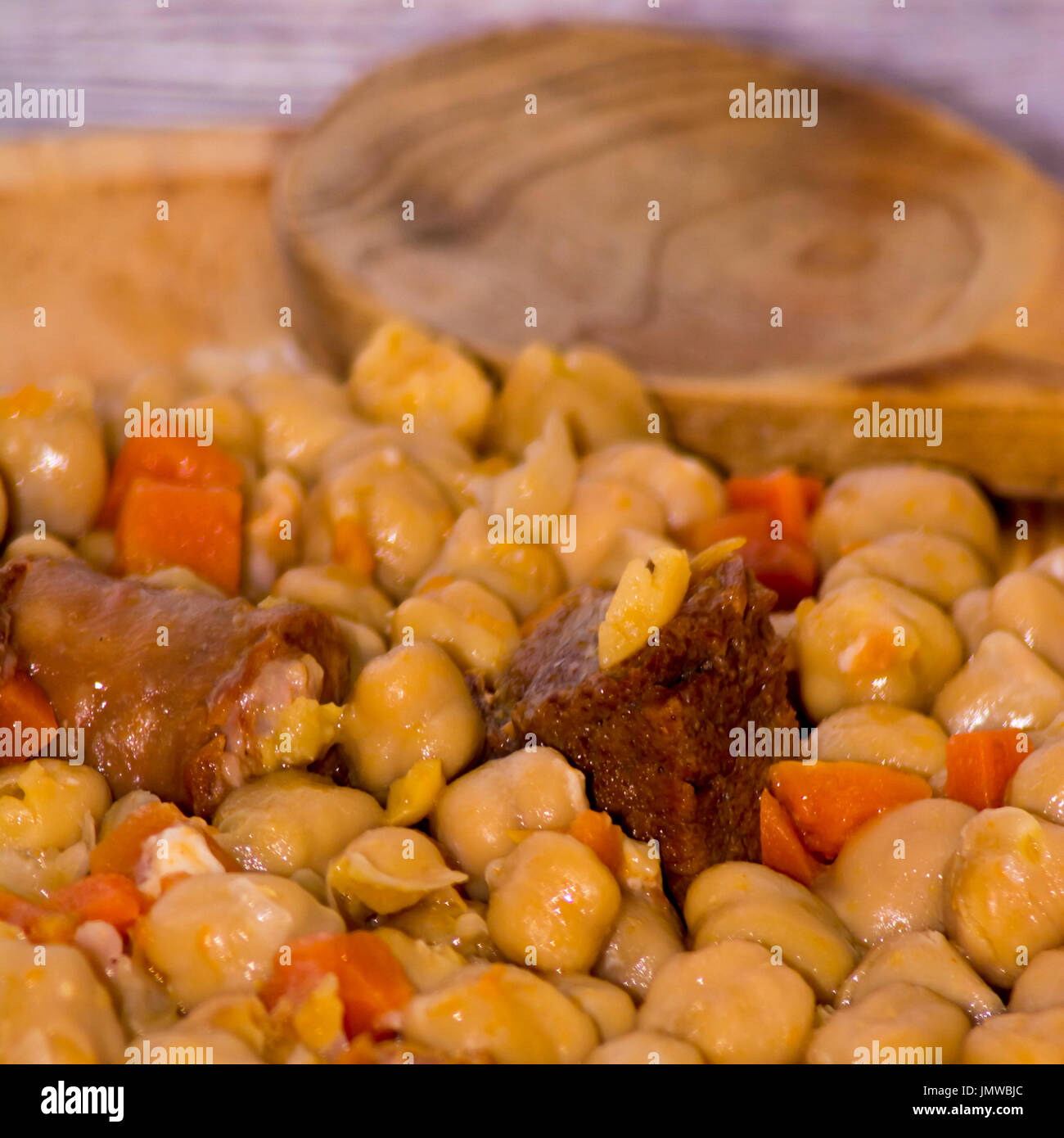 Madrid stew on a plate on a wooden table, typical food from Spain Stock ...