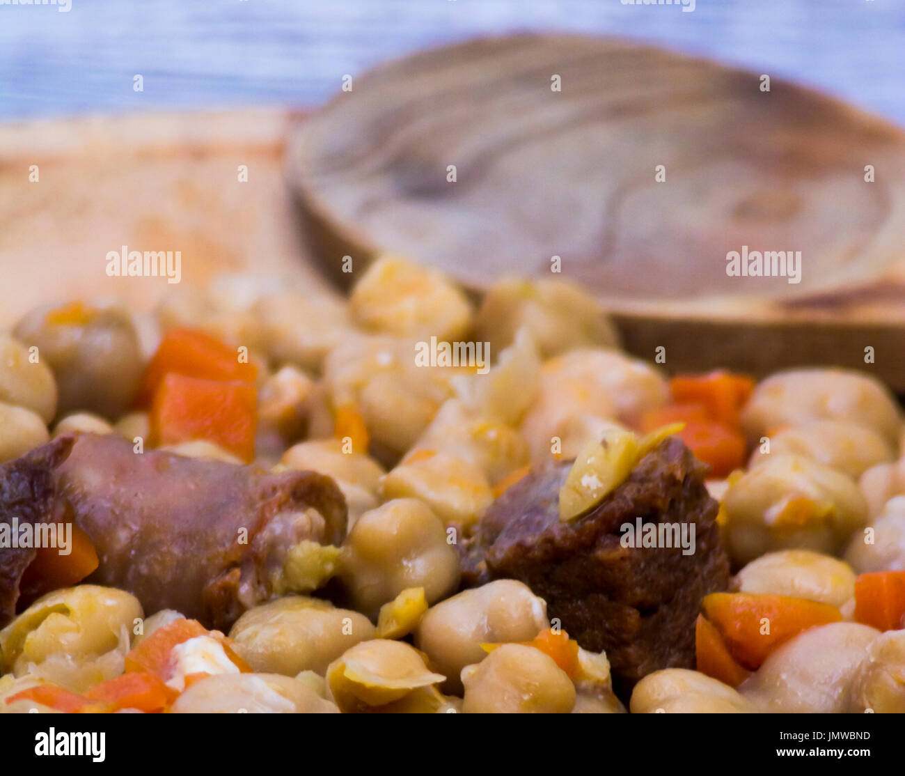 Madrid stew on a plate on a wooden table, typical food from Spain Stock ...