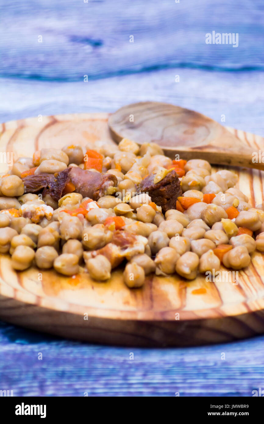 Madrid stew on a plate on a wooden table, typical food from Spain Stock ...