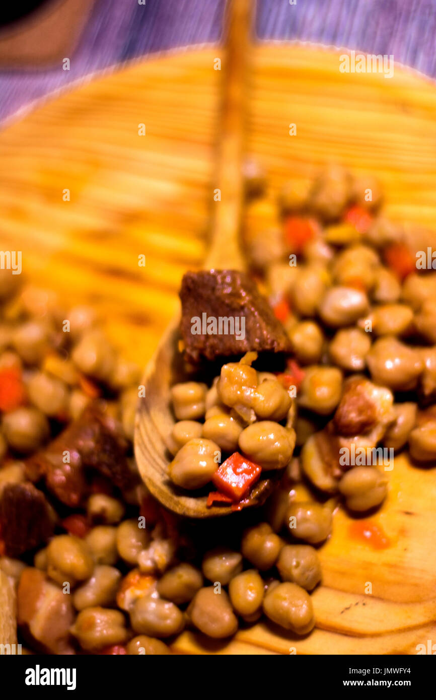 Madrid stew on a plate on a wooden table, typical food from Spain Stock ...