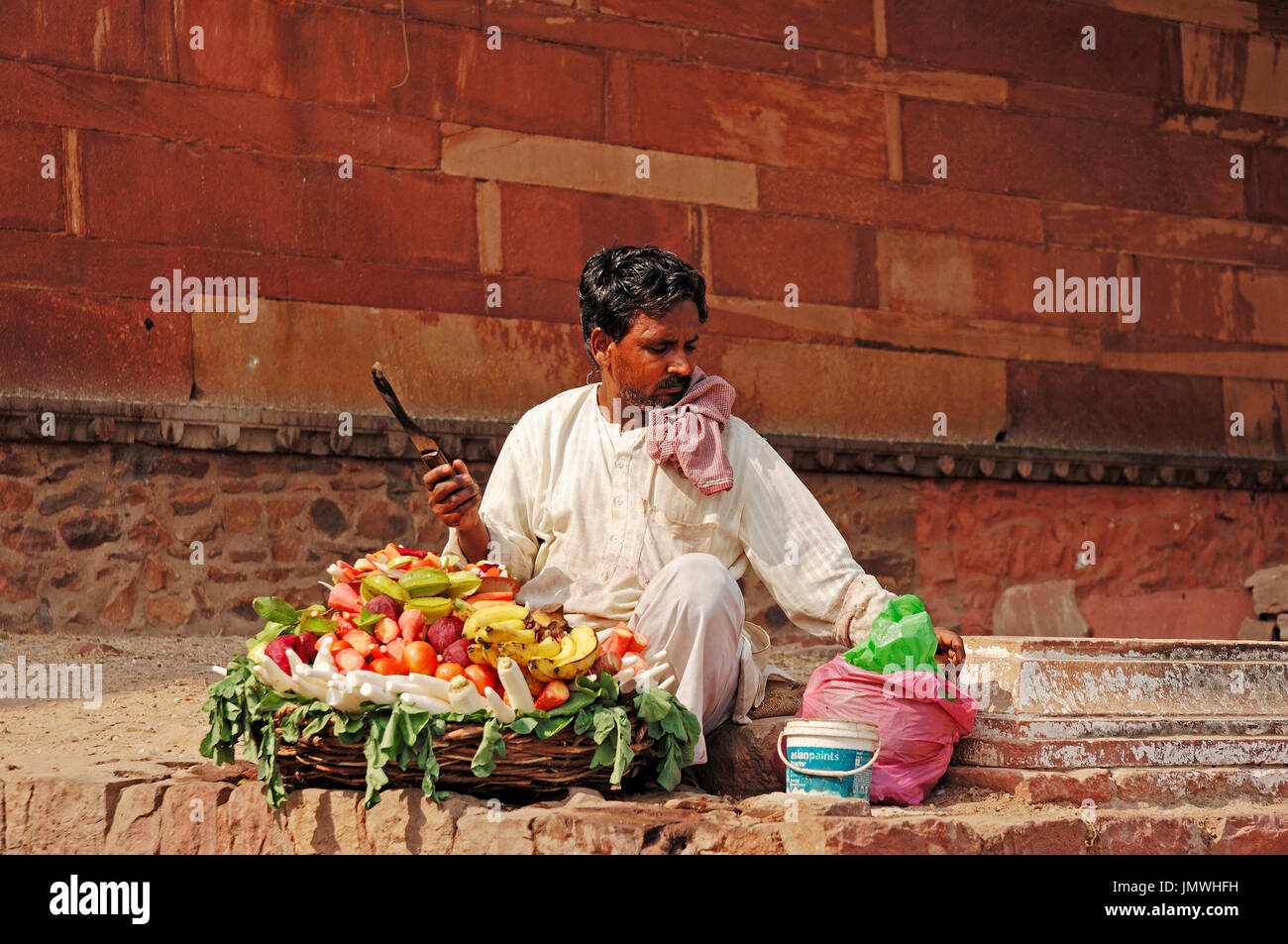 Fruit seller at the Jami Masjid Mosque, Fatehpur Sikri, Uttar Pradesh ...
