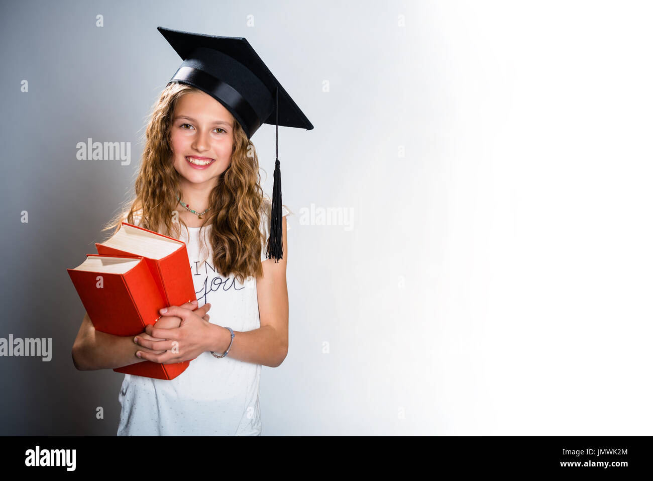 Female student with graduation hat Stock Photo - Alamy
