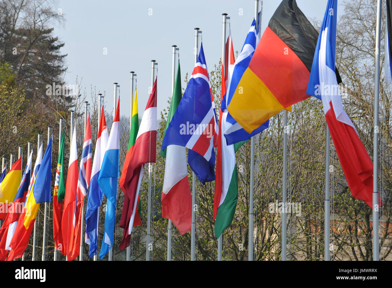 Baden-Baden, Germany - April 4, 2009 -- Flags of the NATO members fly ...