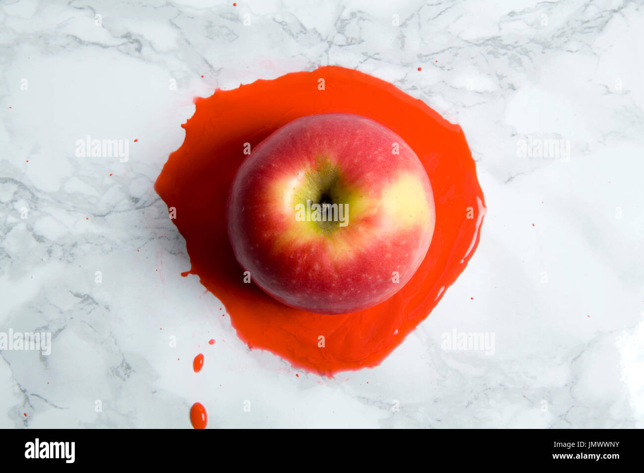 An apple melting on a marble background. minimal color still life ...