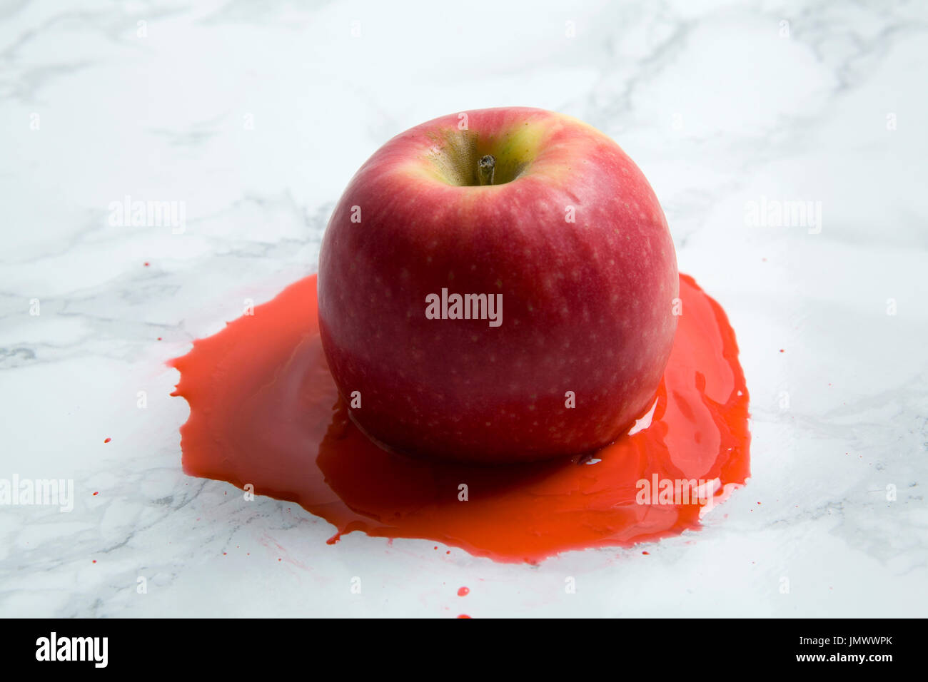 An apple melting on a marble background. minimal color still life ...