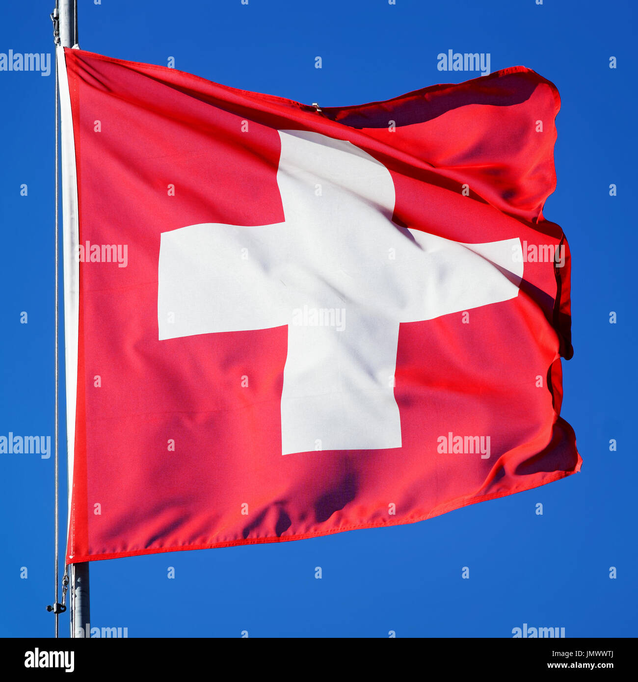 Swiss Flag waving in the wind Stock Photo - Alamy