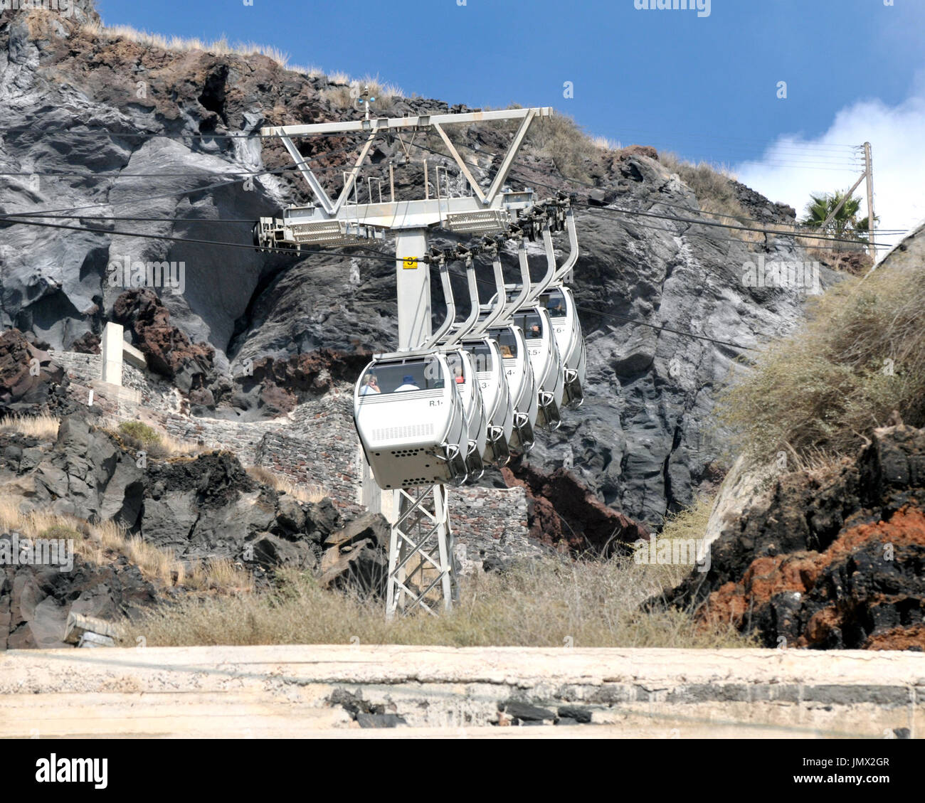 Cable cars over the donkey and foot path leading from the harbor to the ...