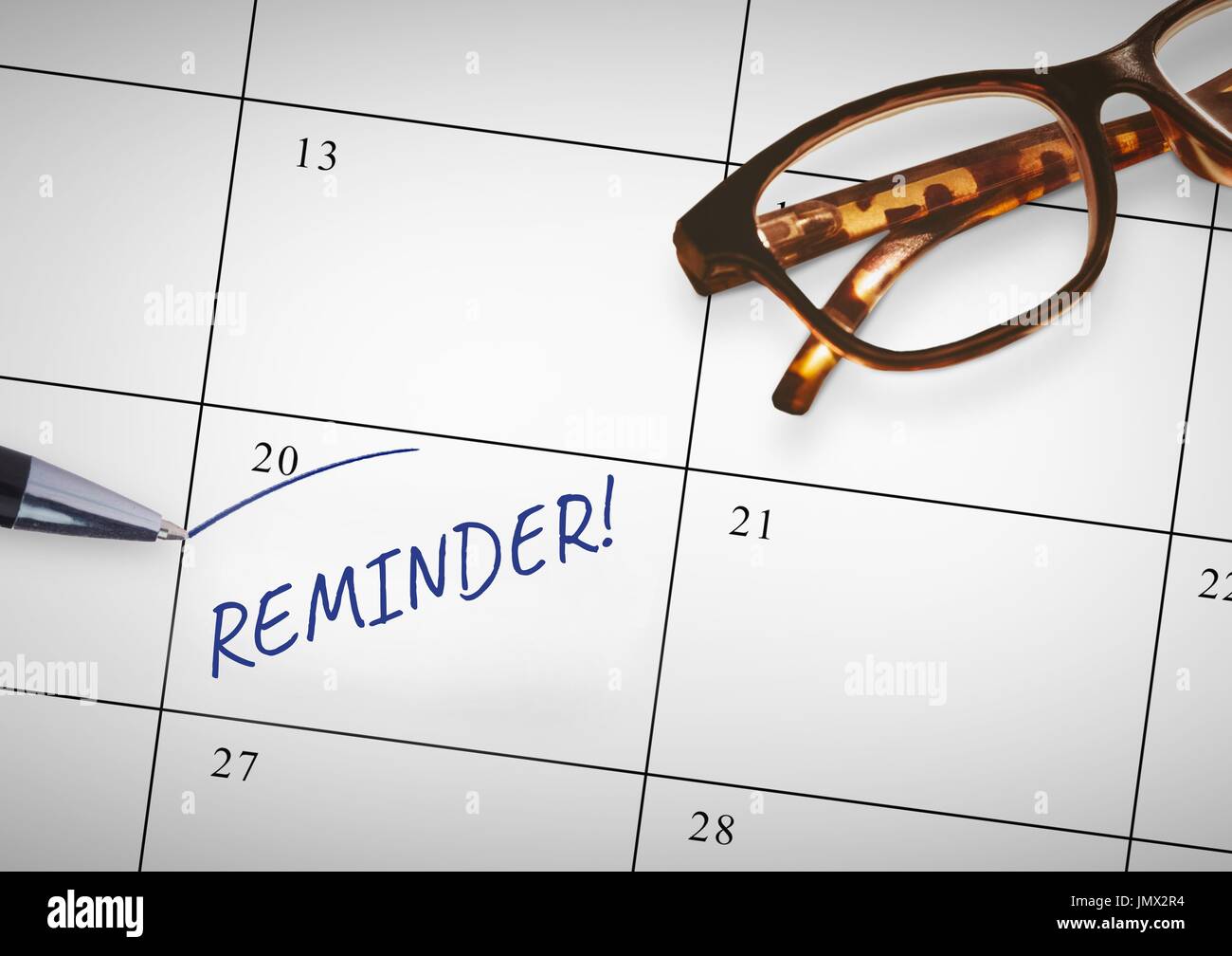 Digital composite of Reminder Text written on calendar with marker ...