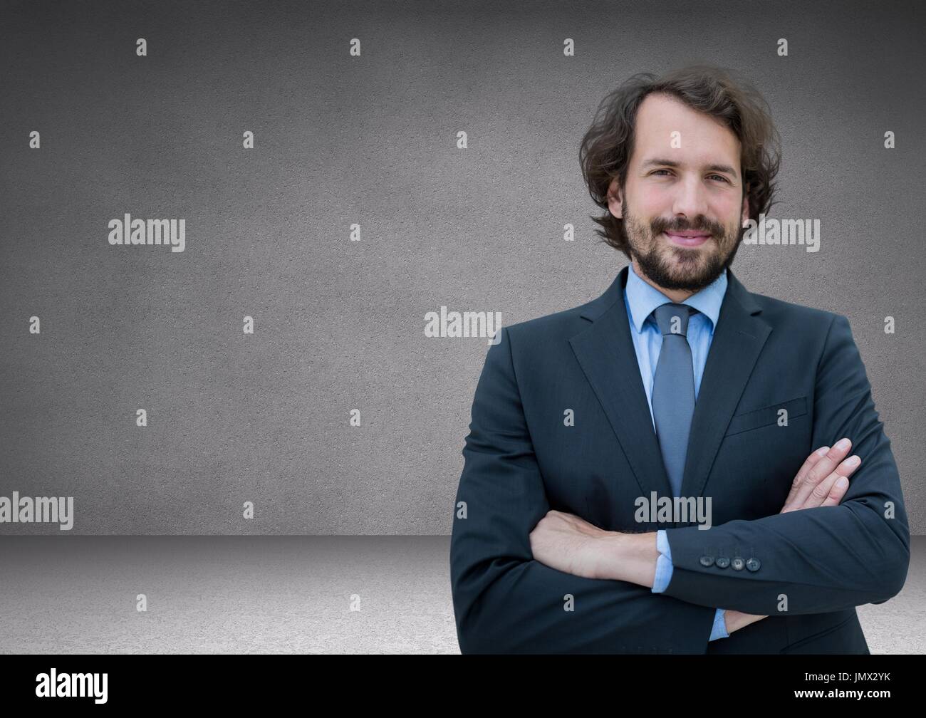 Digital composite of Man standing grey background Stock Photo - Alamy