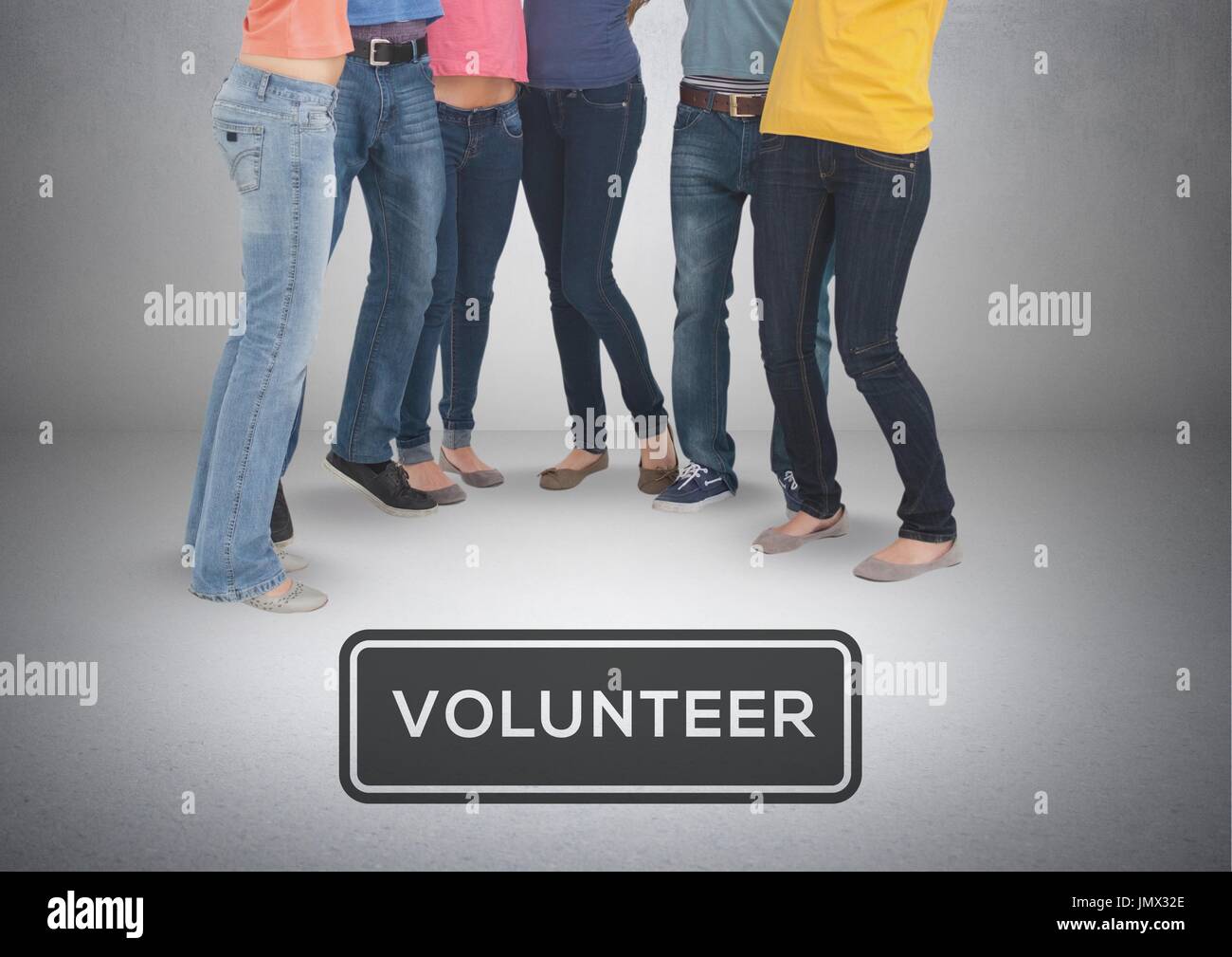 Digital composite of Group of students standing with Volunteer text ...
