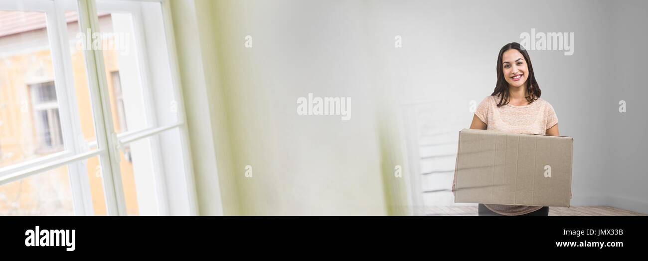 Digital composite of Happy woman moving boxes in her new house Stock ...