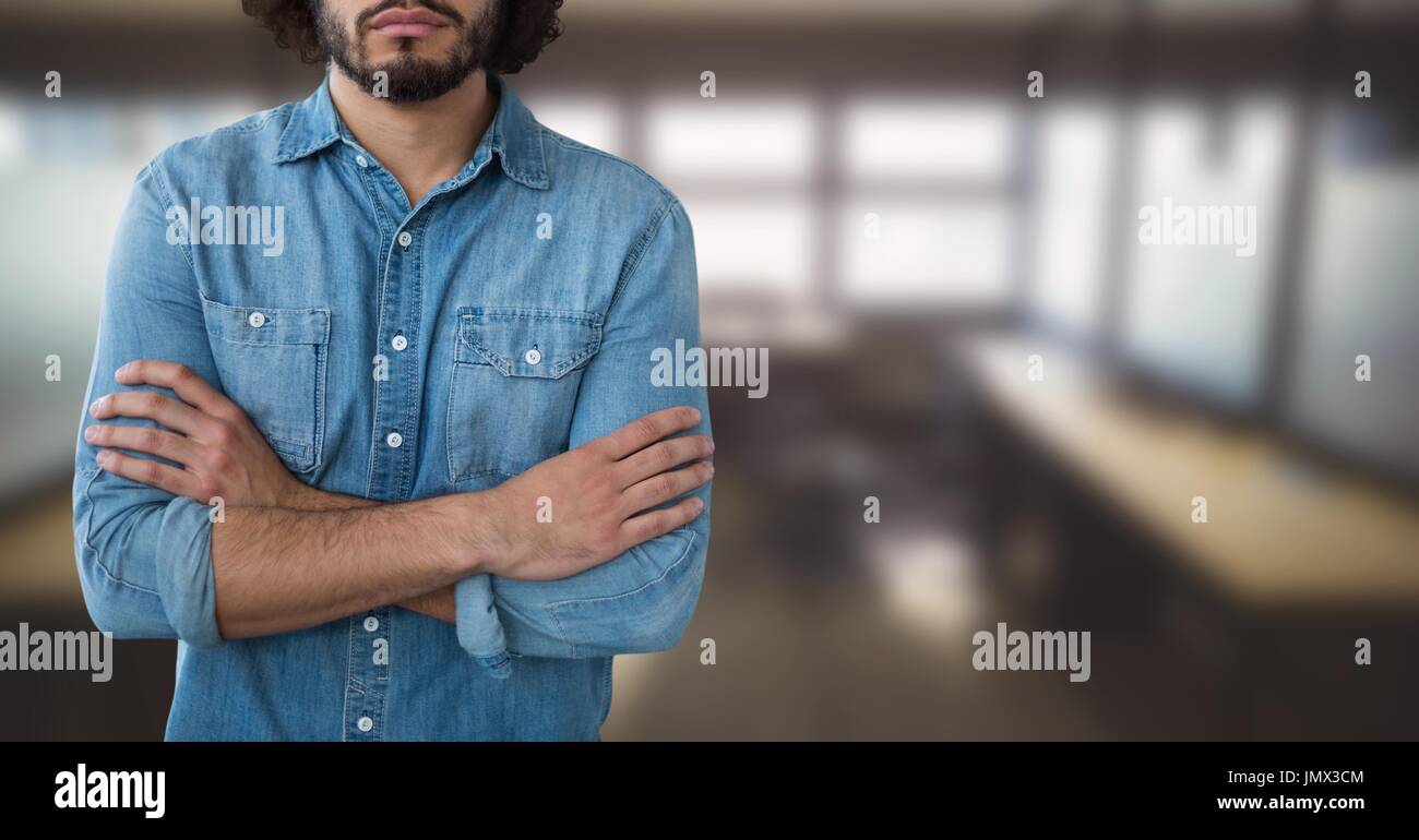 Digital composite of Business man standing against office background ...