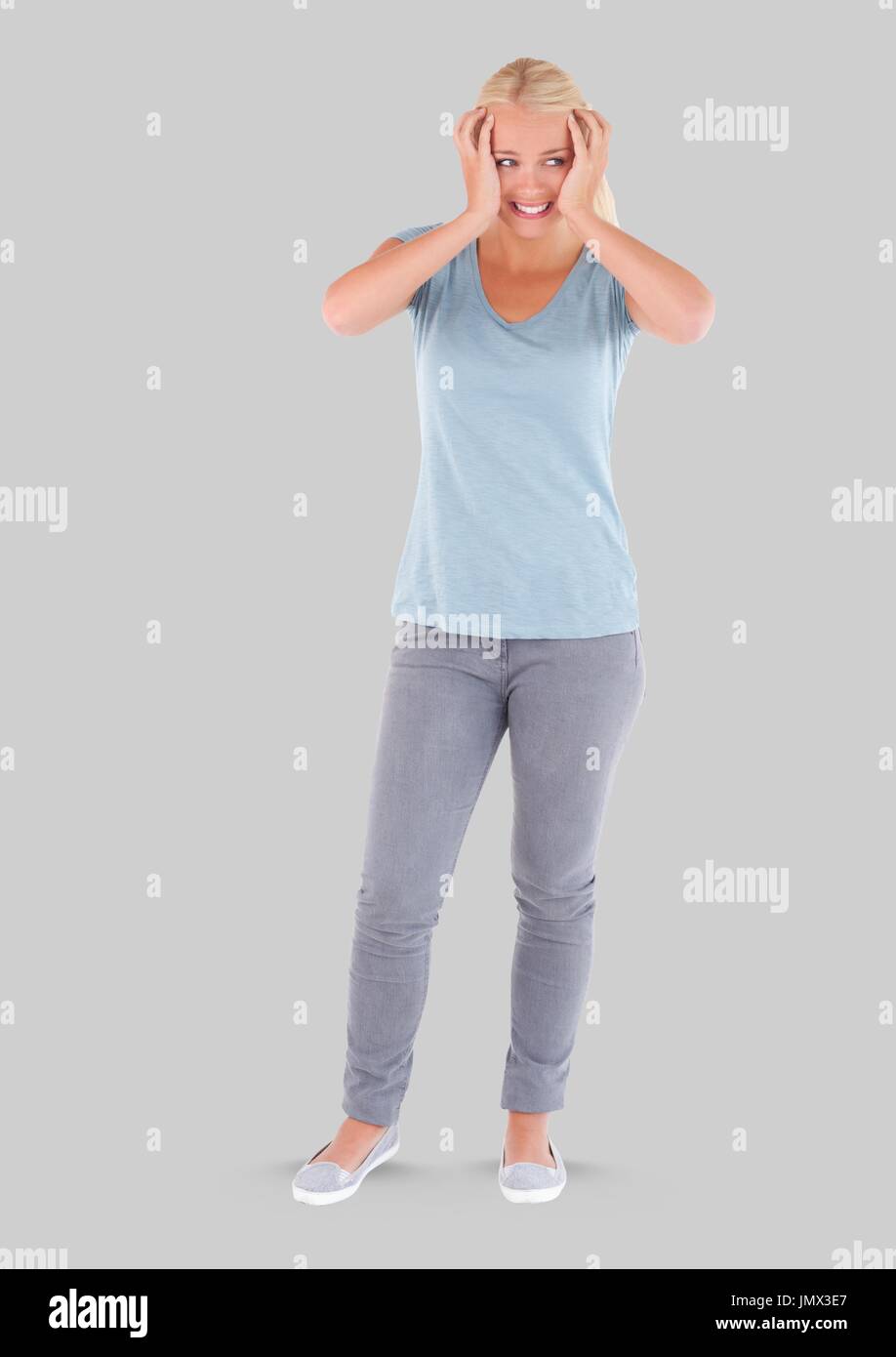 Digital composite of Full body portrait of stressed woman standing with ...