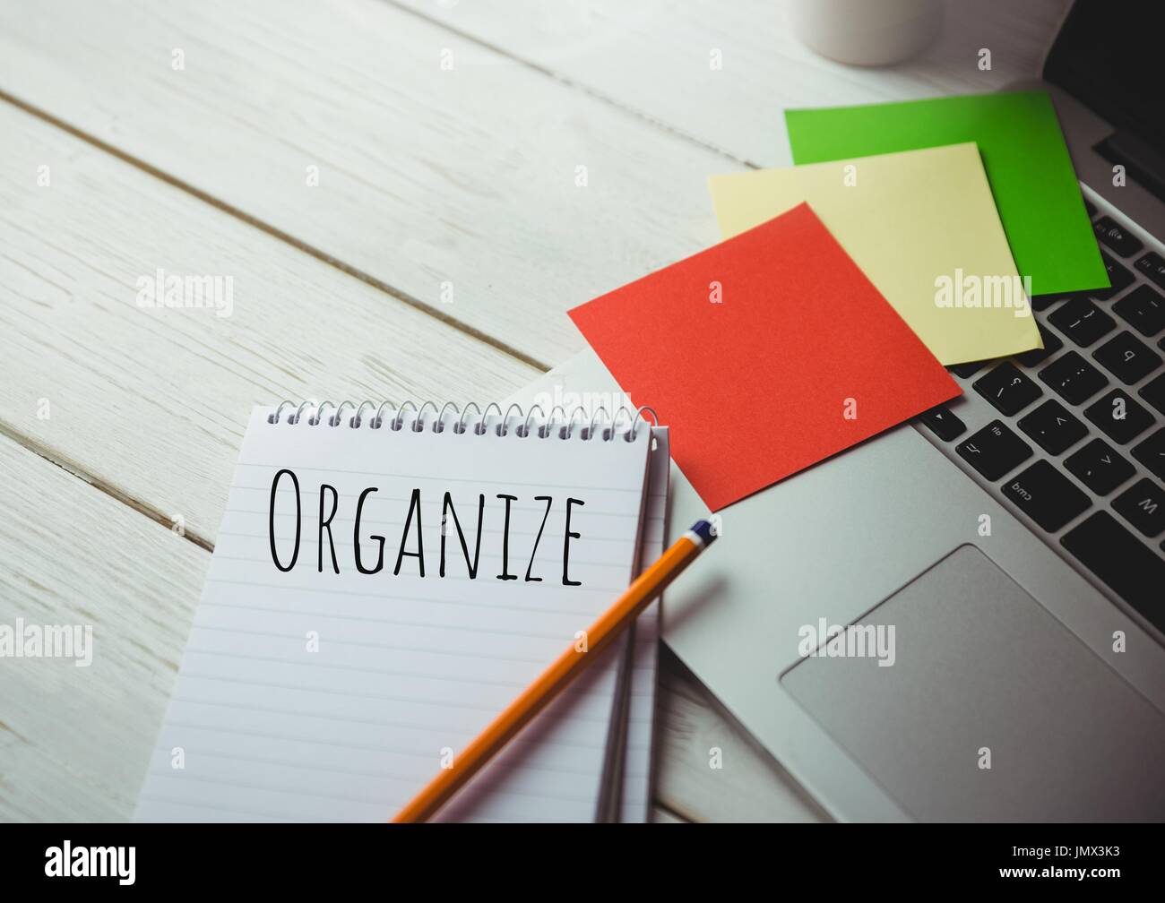 Digital composite of Organize text written on page with sticky notes ...