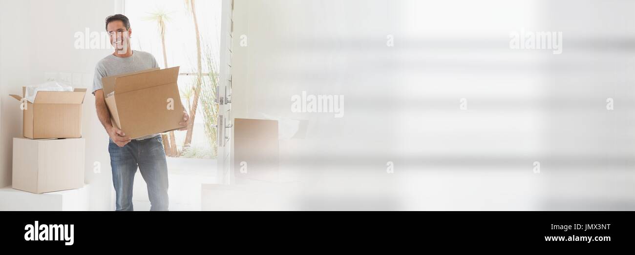 Digital composite of Happy man moving boxes in his new house Stock ...