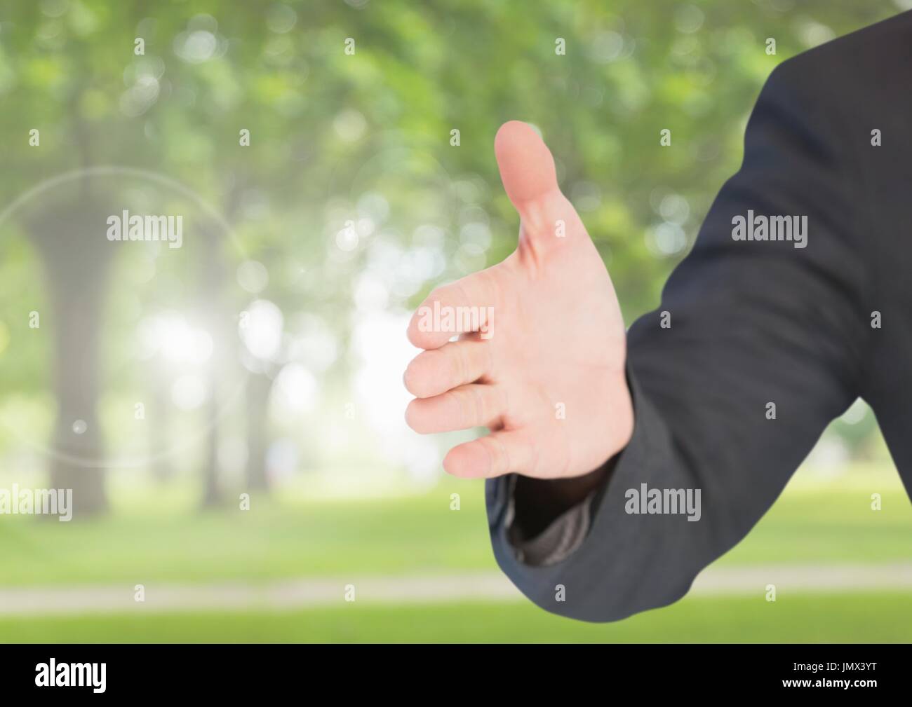 Business hand shake lens flare hi-res stock photography and images - Alamy