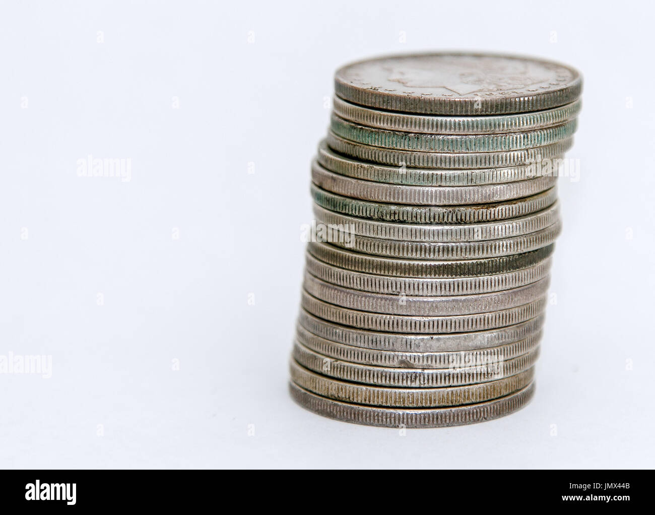 Stack of Morgan Dollar coins on white background Stock Photo - Alamy
