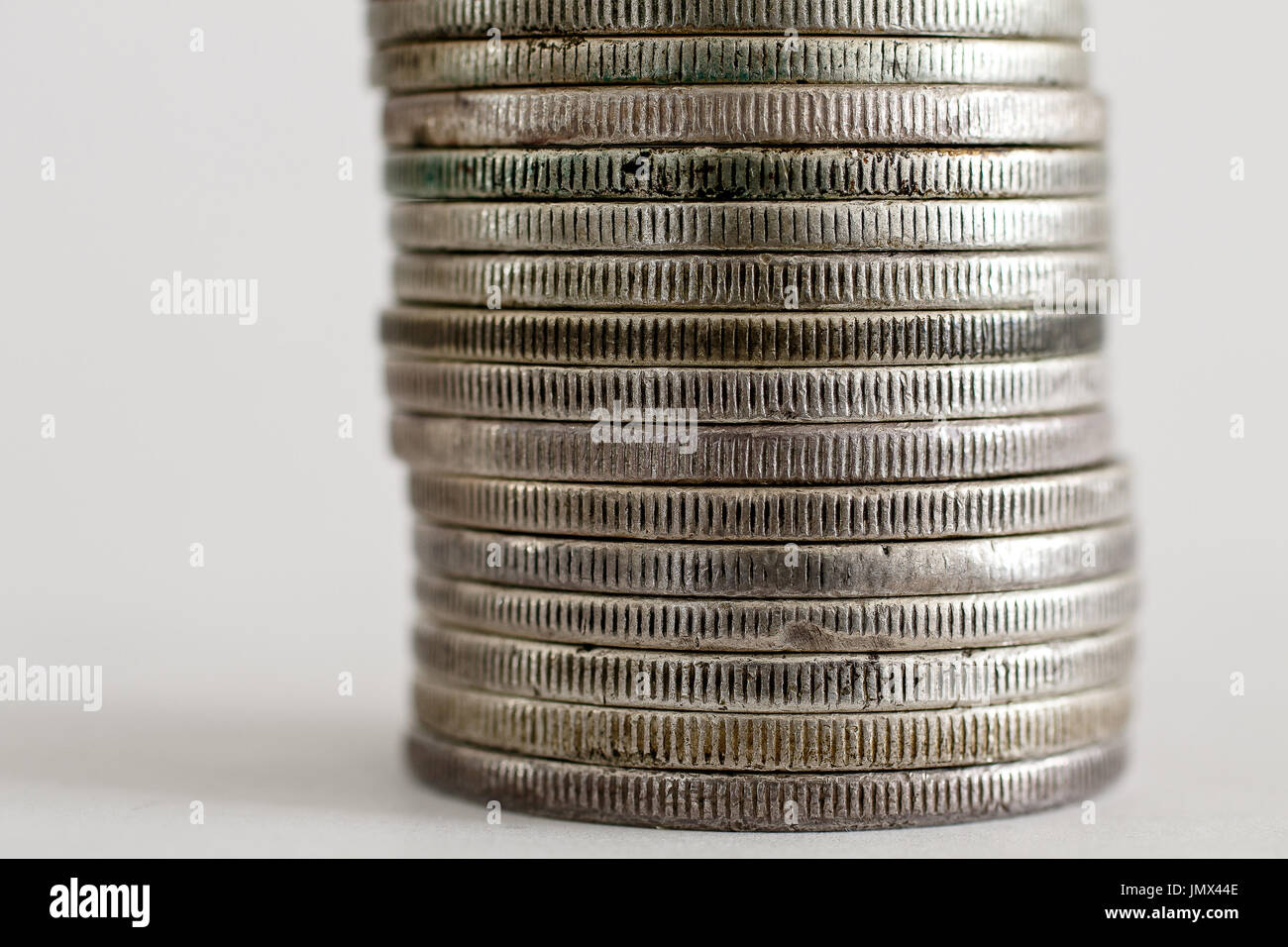 Stack of Morgan Dollar coins on white background Stock Photo - Alamy