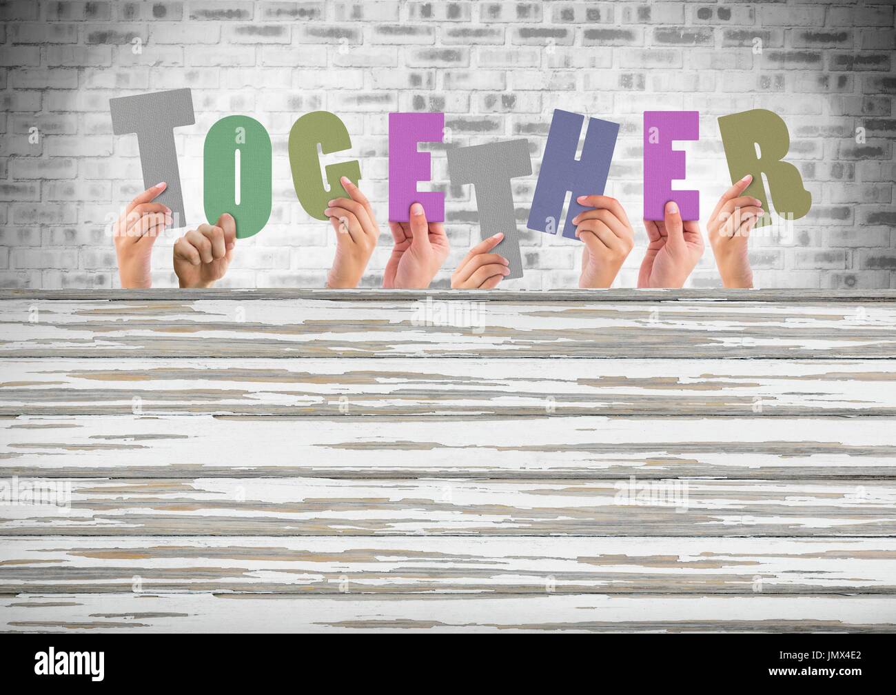 Digital composite of together text letter cut out in front of brick ...