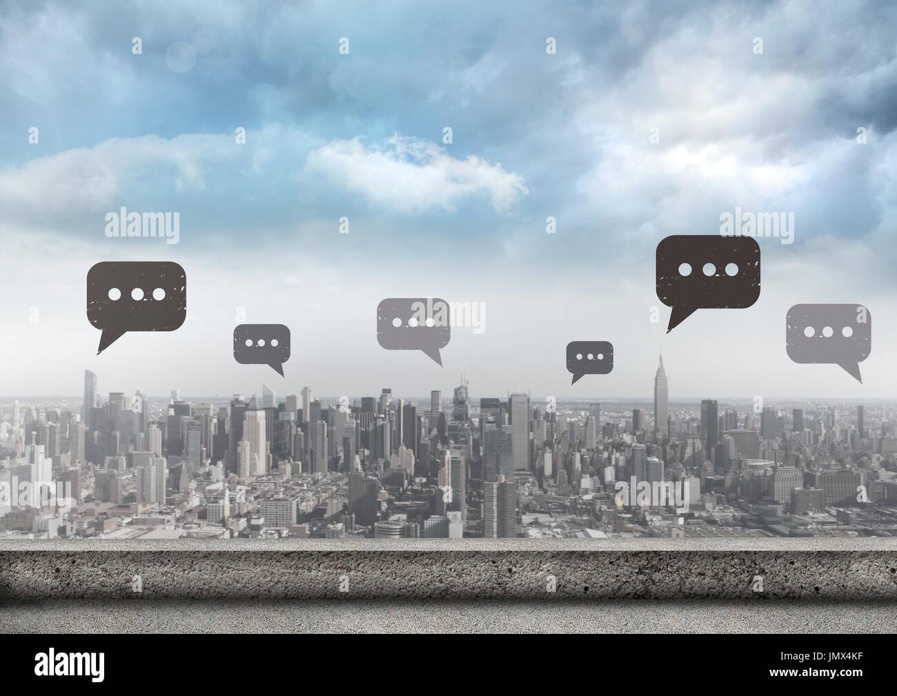Digital composite of Chat bubble icons over city Stock Photo - Alamy