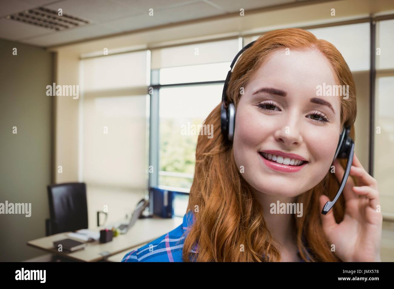Digital composite of Happy customer care representative woman against ...