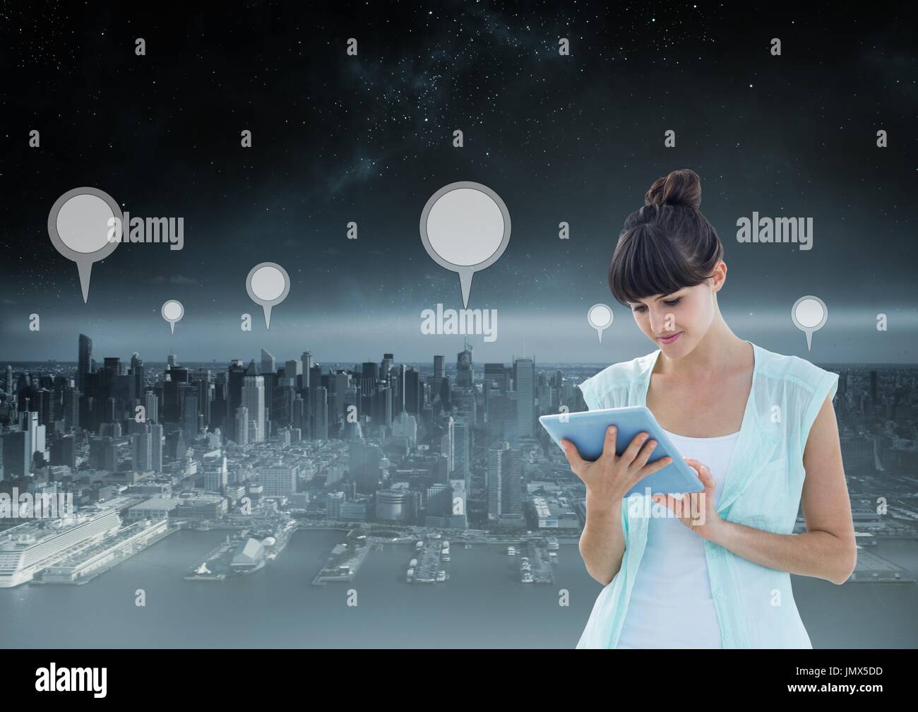 Digital composite of Holding tablet and City with marker location ...