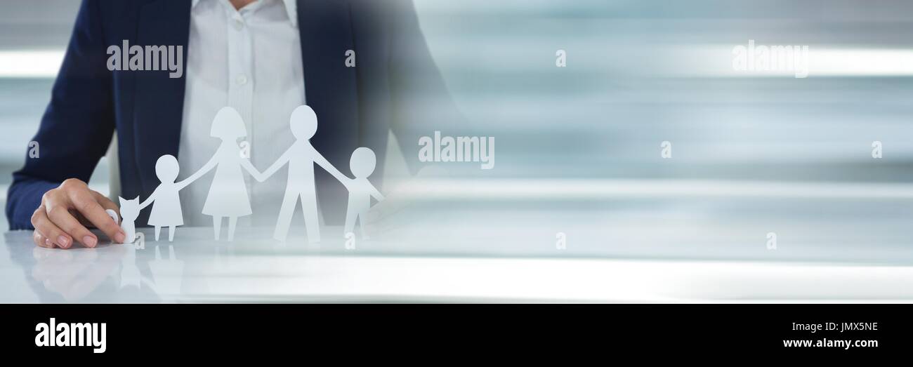 Woman holding paper figures hi-res stock photography and images - Alamy