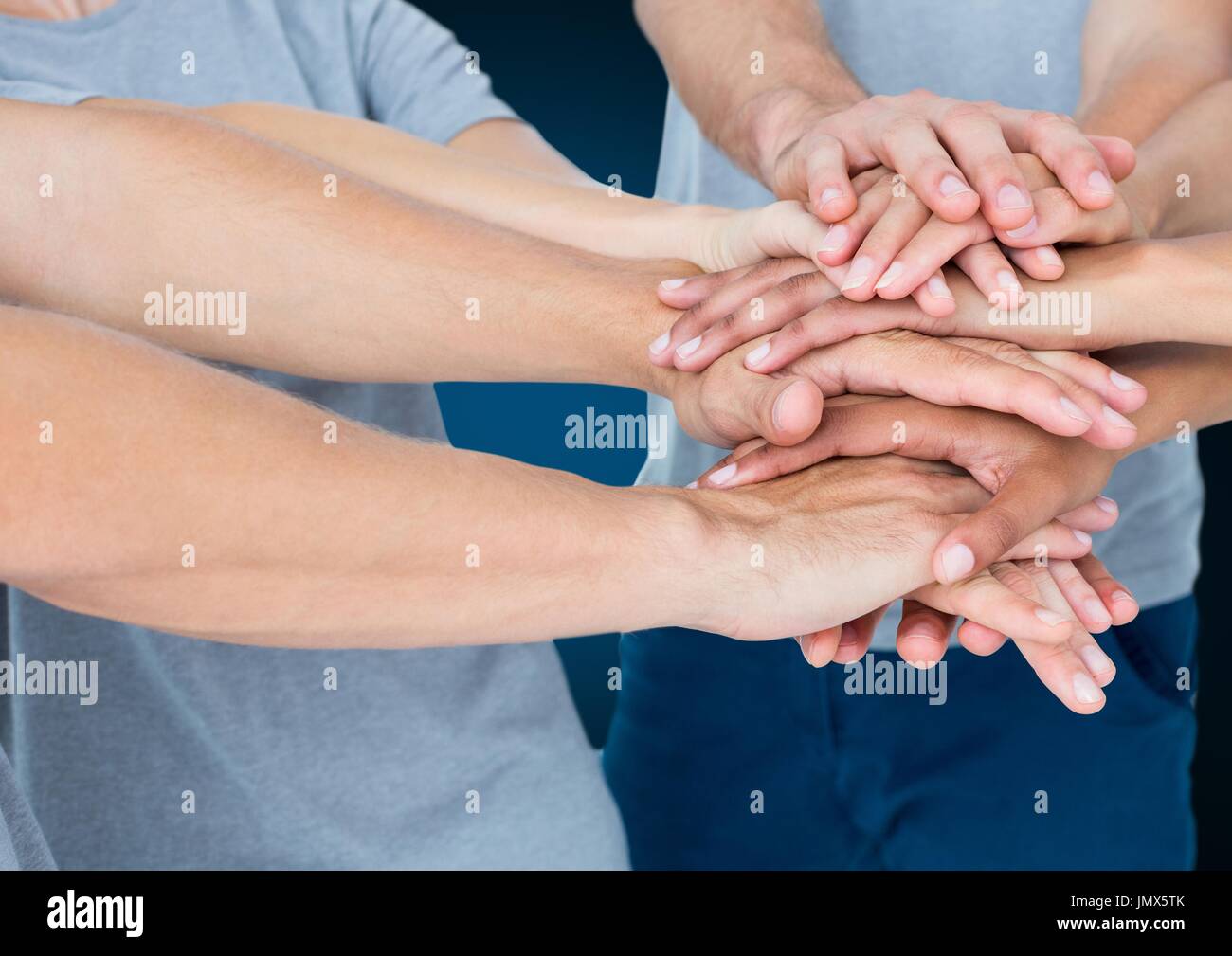 Digital composite of Lots of hands together with blue background Stock ...