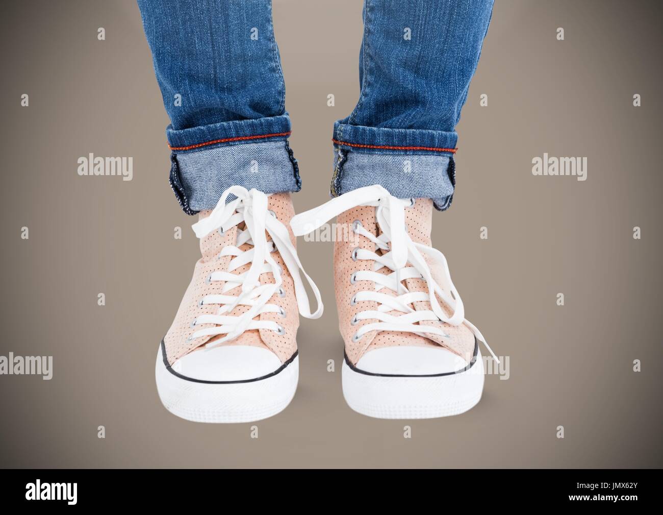 Digital composite of Feet and shoes with brown background Stock Photo ...