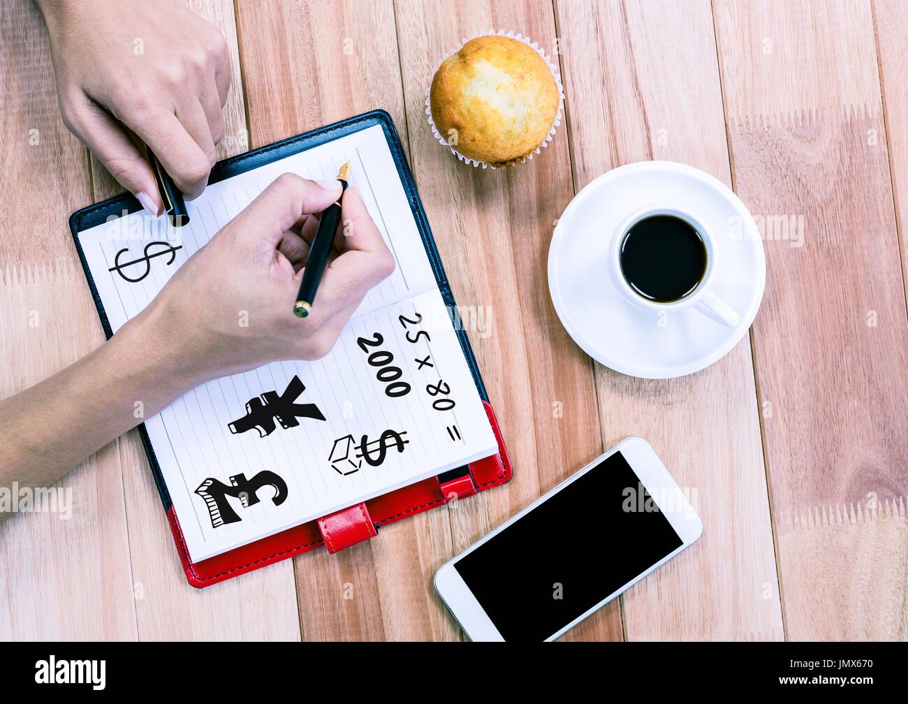 Digital composite of Money currency drawings on notepad with coffee and ...