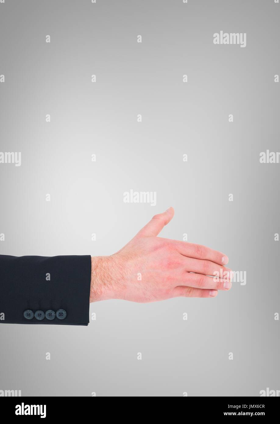 Digital composite of Hand reaching for handshake Stock Photo - Alamy