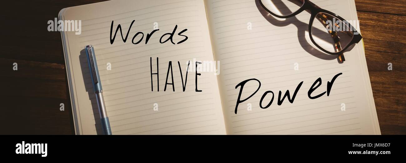 Digital composite of Words have power text written on page with wood ...