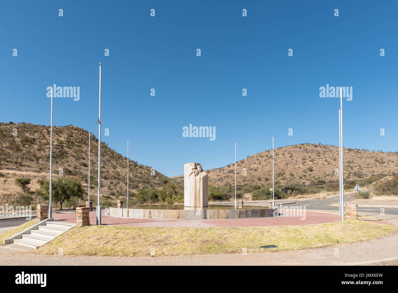 WINDHOEK, NAMIBIA - JUNE 16, 2017: A stone sculpture on the roundabout ...
