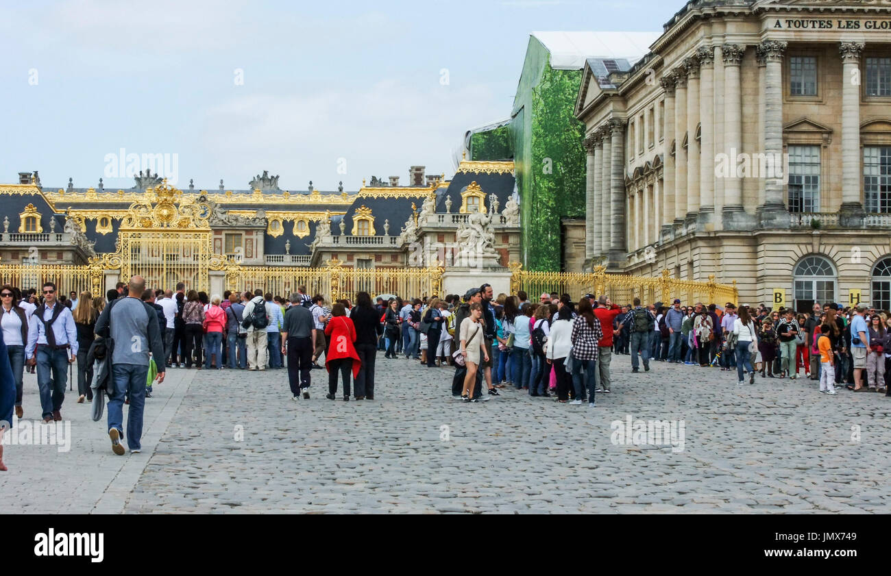 Crowds of tourists visiting the Palace of Versailles in France,Europe ...