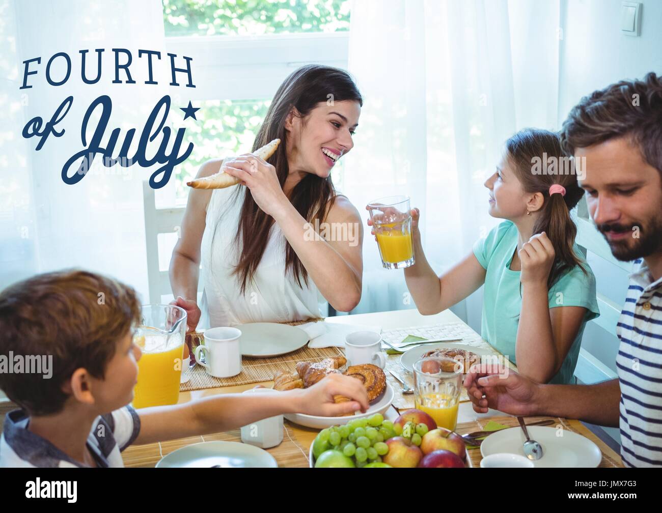 Digital composite of Happy family having lunch for the 4th of July ...