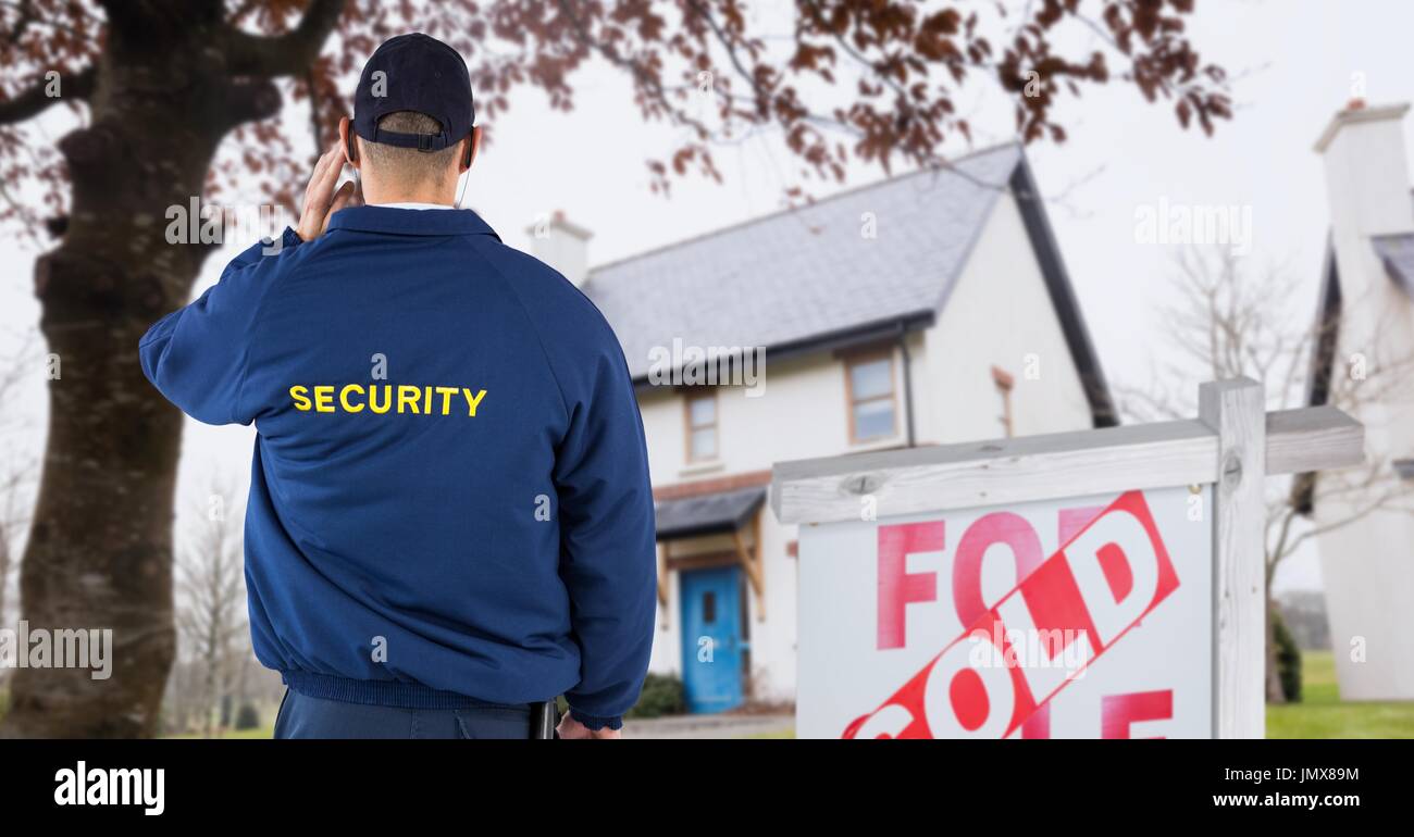 Digital composite of Rear view of security guard standing by sign board ...
