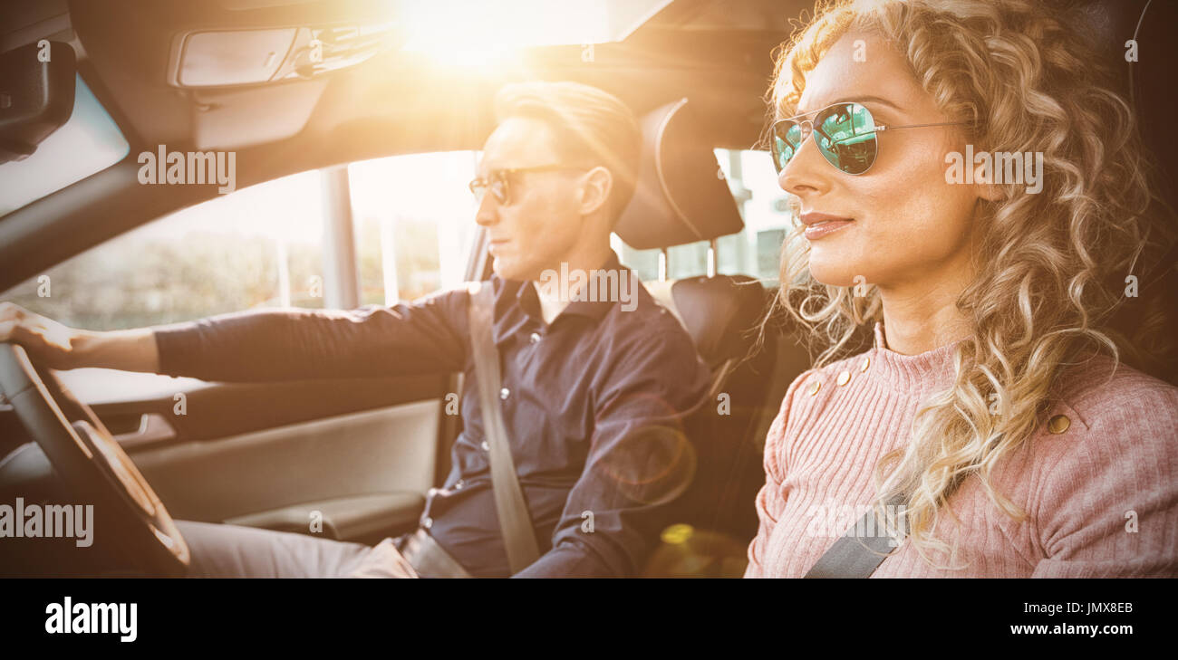 Couple driving car wide hi-res stock photography and images - Alamy