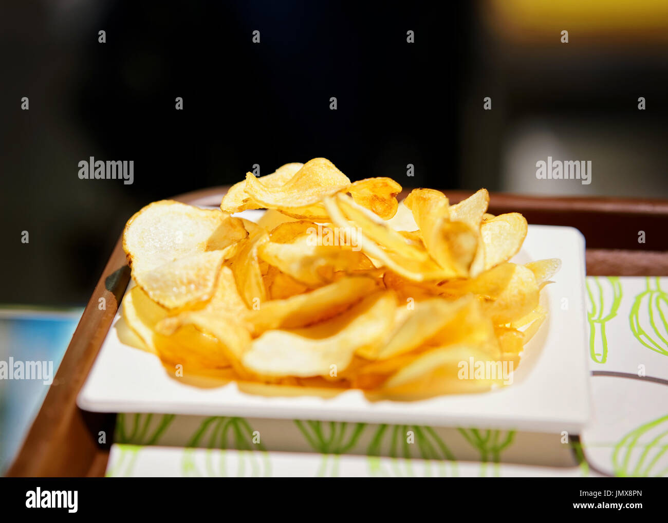Potato chips on white plate at restaurant in Florence, Tuscany, Italy ...