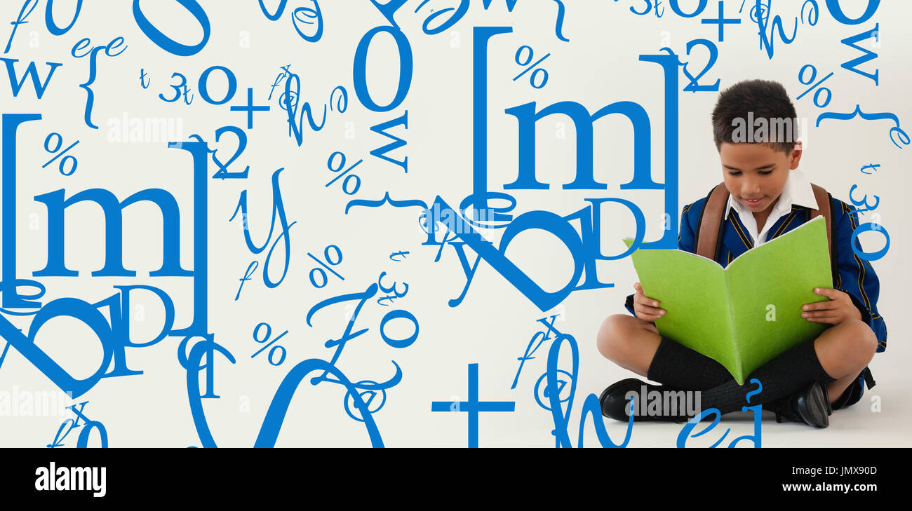 letter and number jumble against schoolboy reading book on white ...