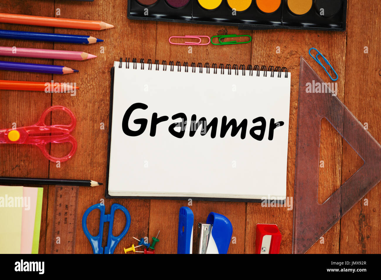 Grammer text on white background against overhead view of school ...