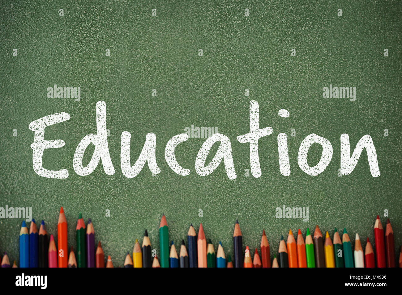 Education text on white background against overhead view of colored ...